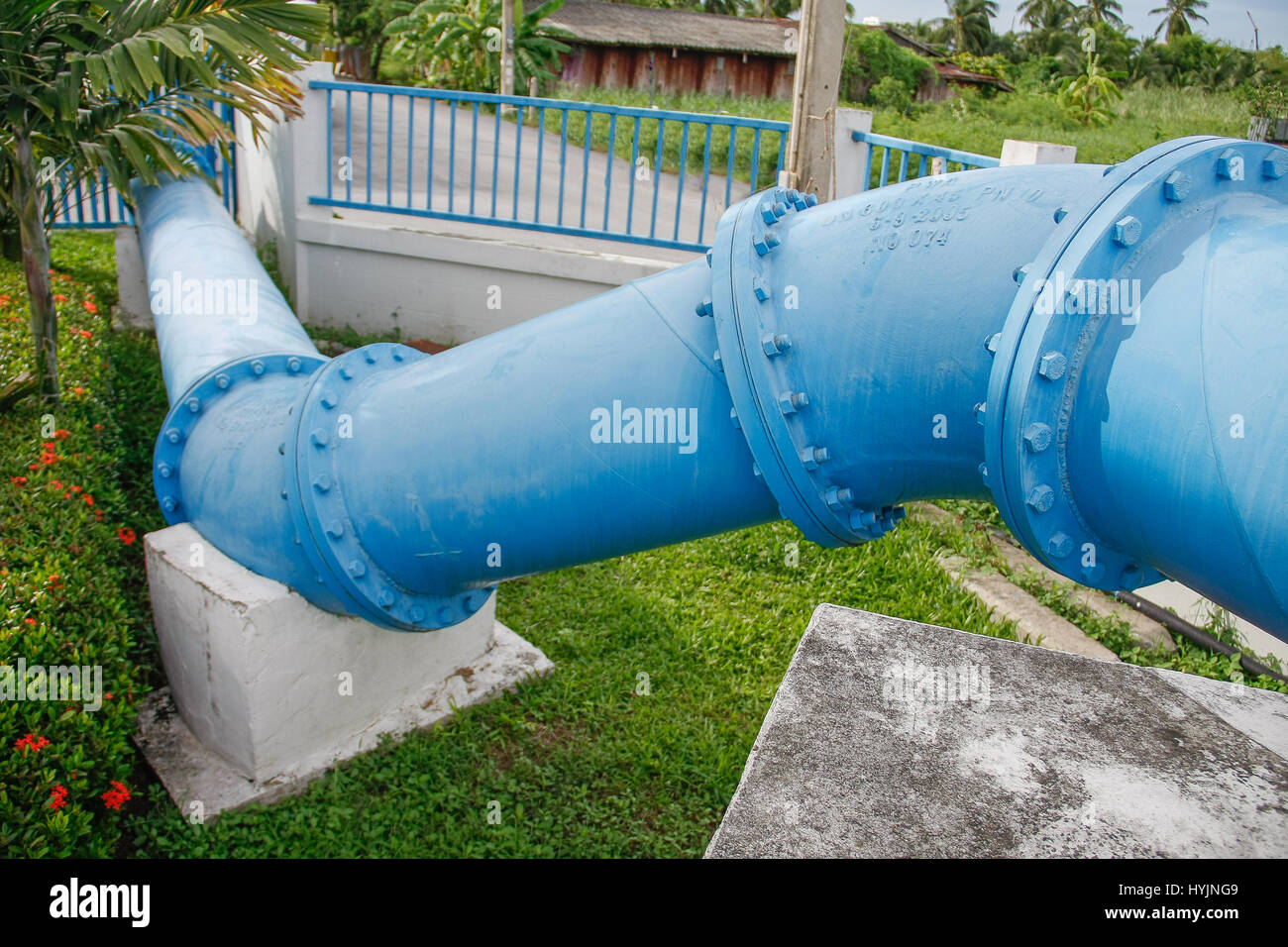 big blue Steel pipes and couplings of an irrigation water Stock Photo ...
