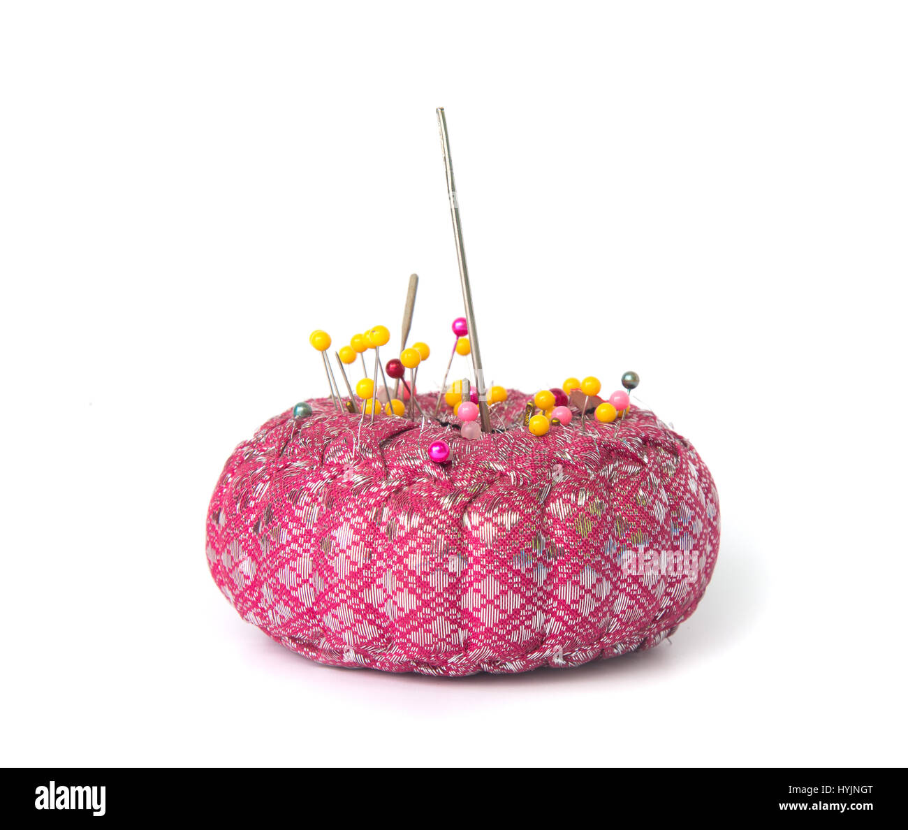 Pins and needle on pillow for sewing isolated on white background Stock ...