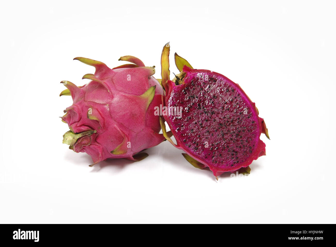 Purple dragon fruit on white background Stock Photo - Alamy