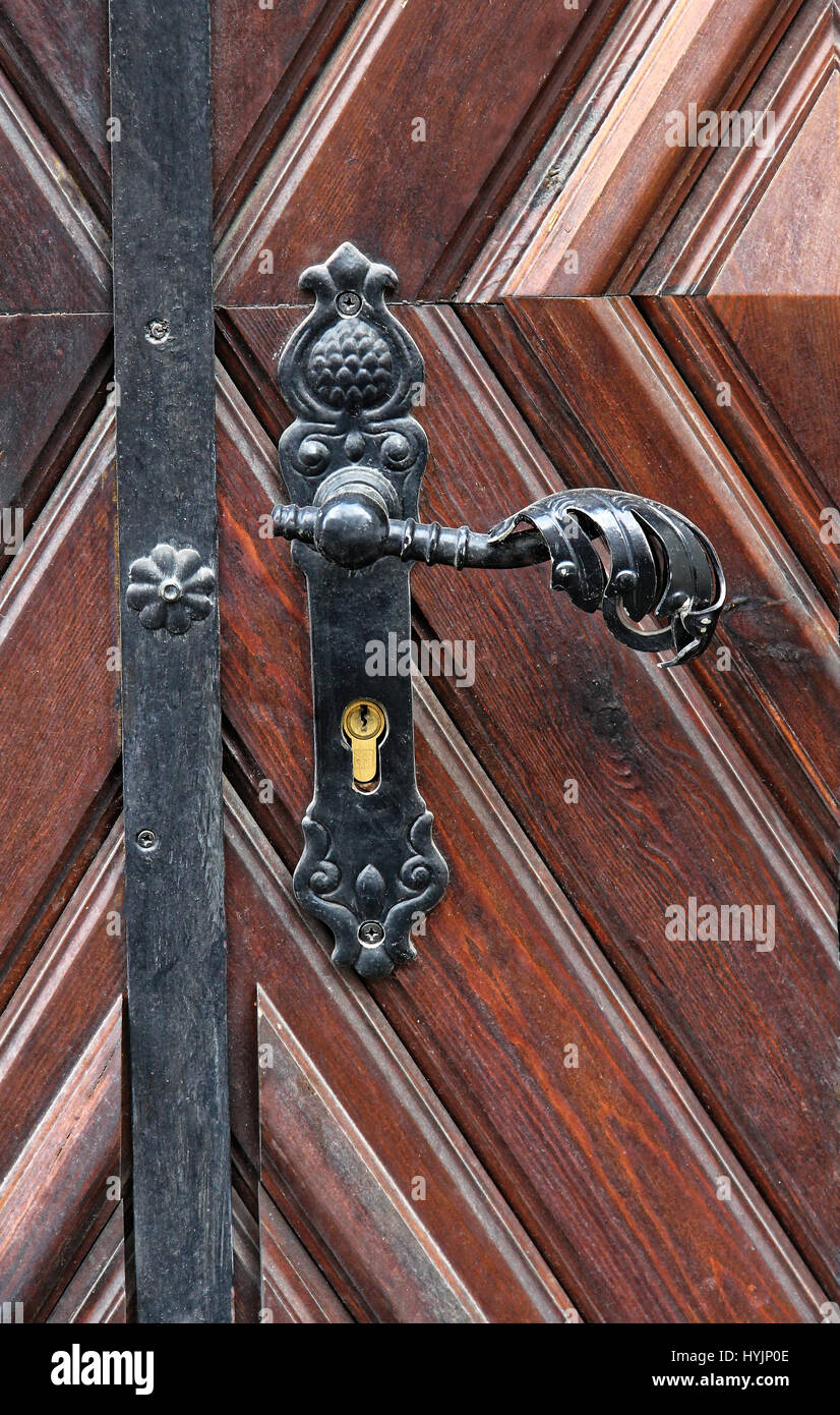 ornate entrance gate old metal door handle Stock Photo - Alamy