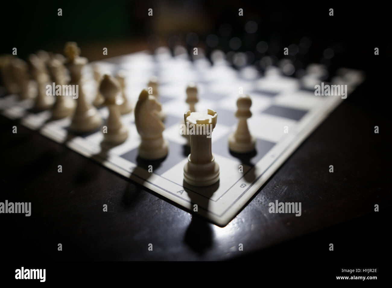 Image of the white pieces on a chess board, with shallow depth of field ...