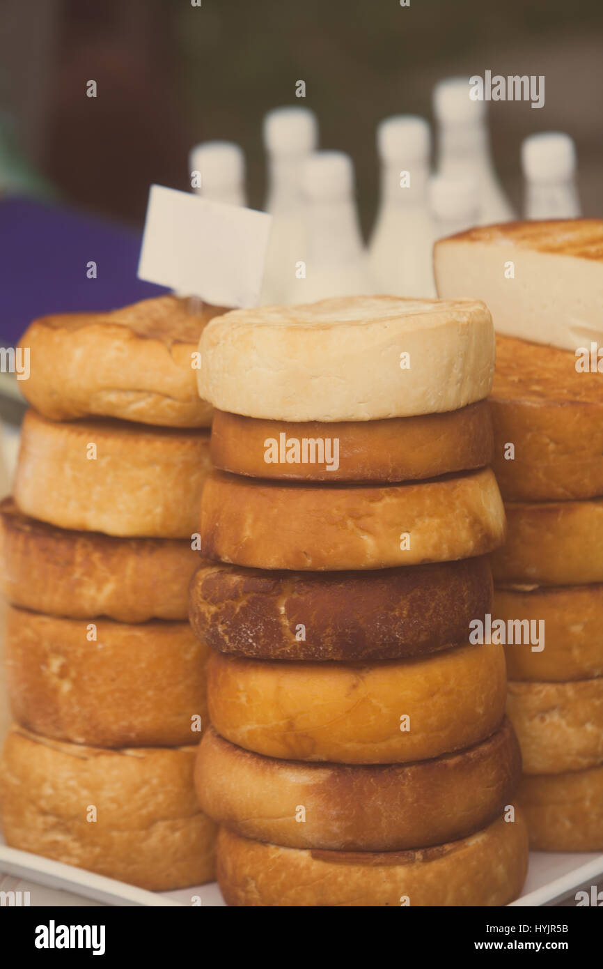 Close up shot of a pile of traditional home made round cheese Stock ...