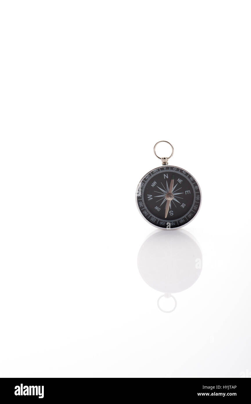 Compass isolated with white background Stock Photo - Alamy