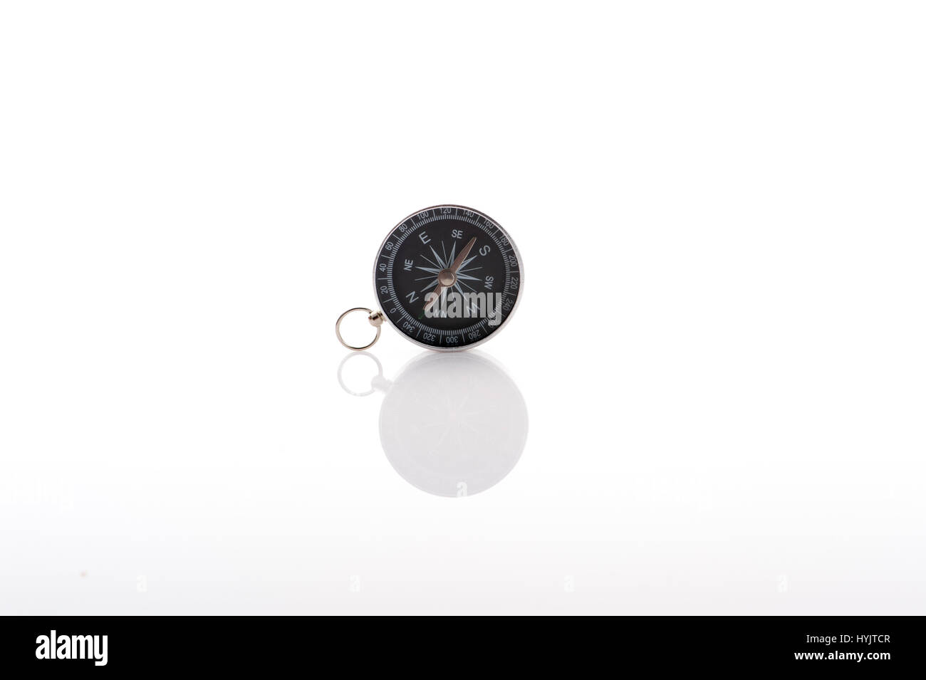 Compass isolated with white background Stock Photo - Alamy