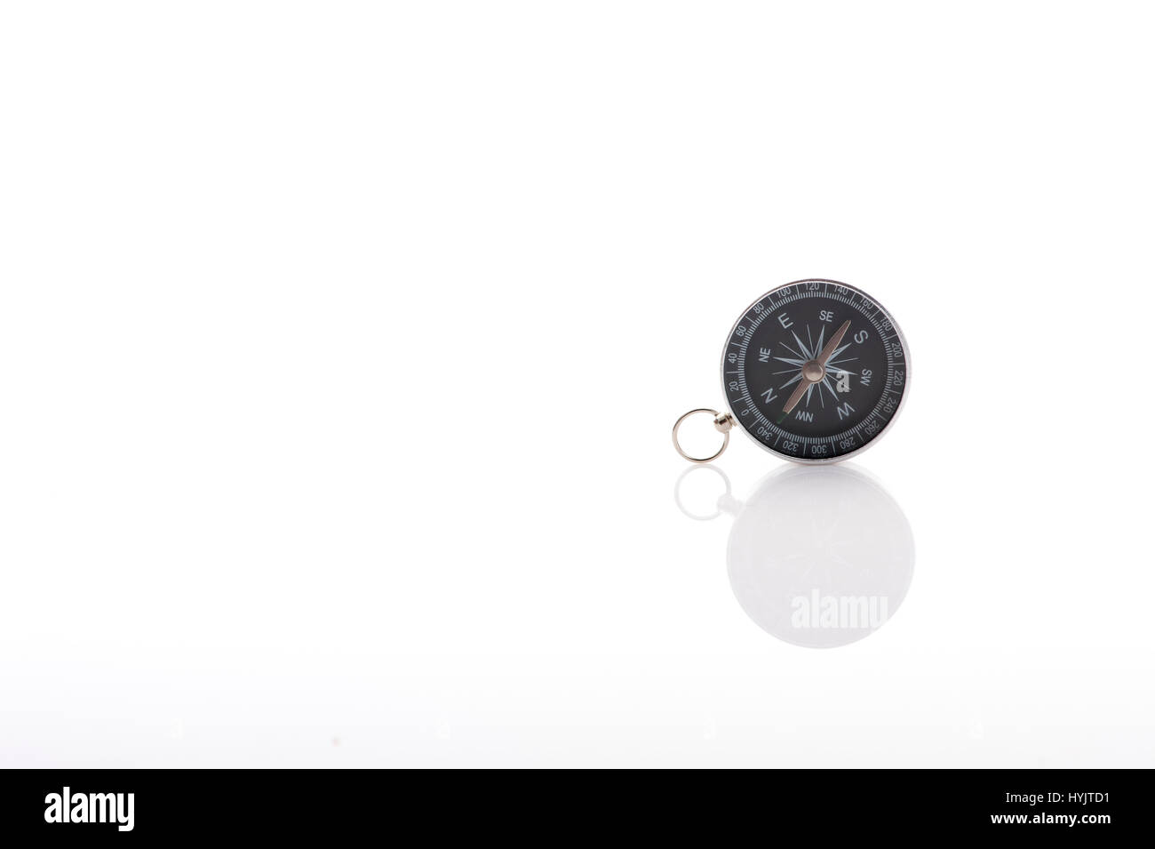 Compass isolated with white background Stock Photo - Alamy