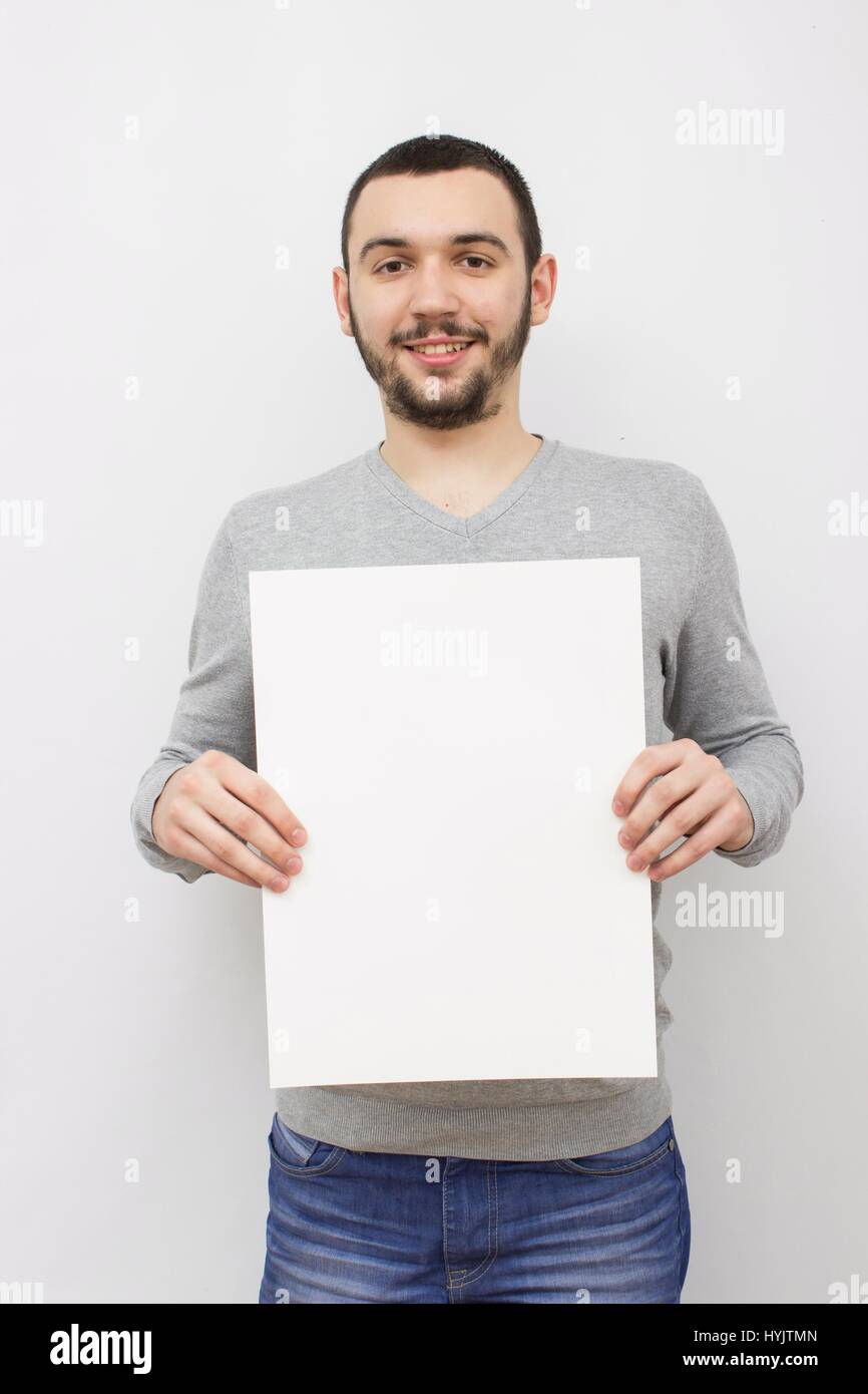 Young man posing on light background. Mock up Stock Photo - Alamy