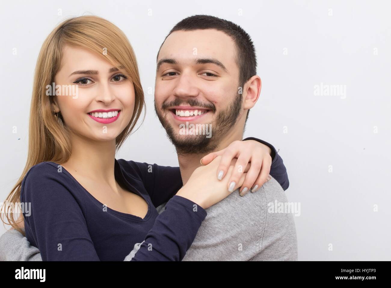 Casual loving couple posing Stock Photo - Alamy
