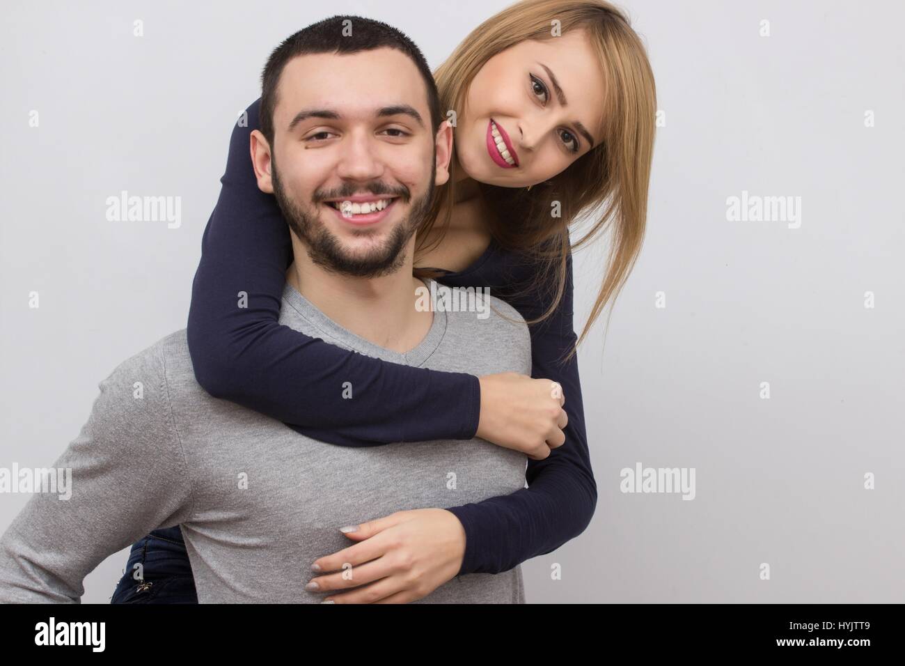 Casual loving couple posing Stock Photo - Alamy
