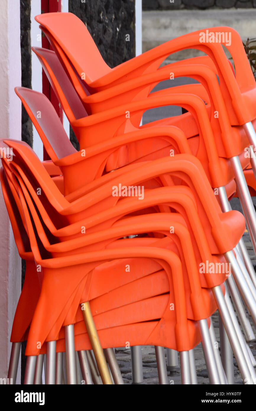 Stacked pile chairs chair hi-res stock photography and images - Alamy