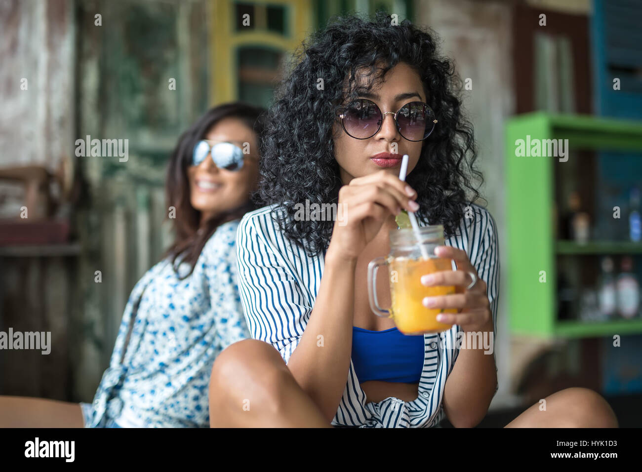 Girls with cocktails Stock Photo - Alamy