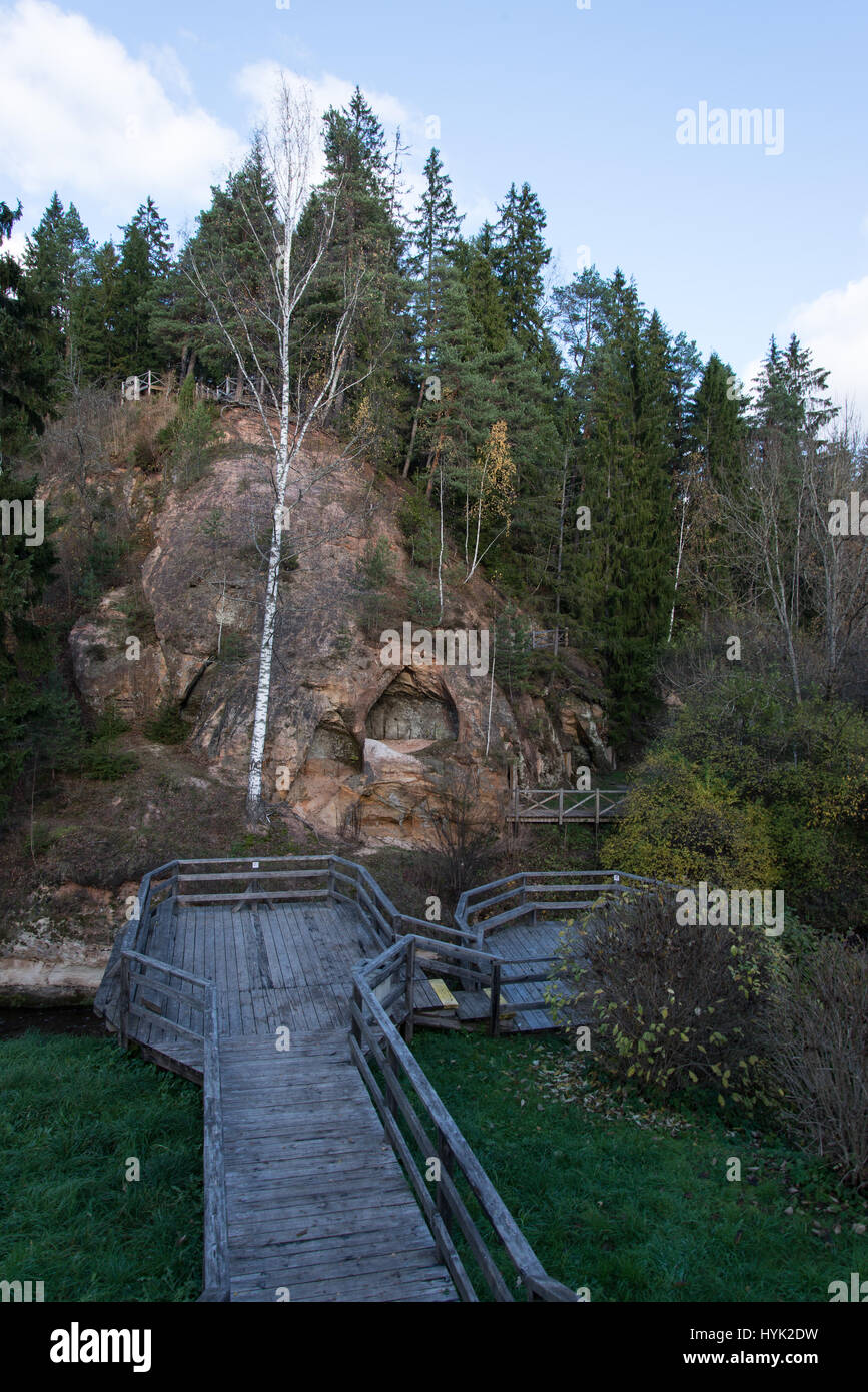ancient sandstone cliffs with inscriptions in the Gaujas National Park ...