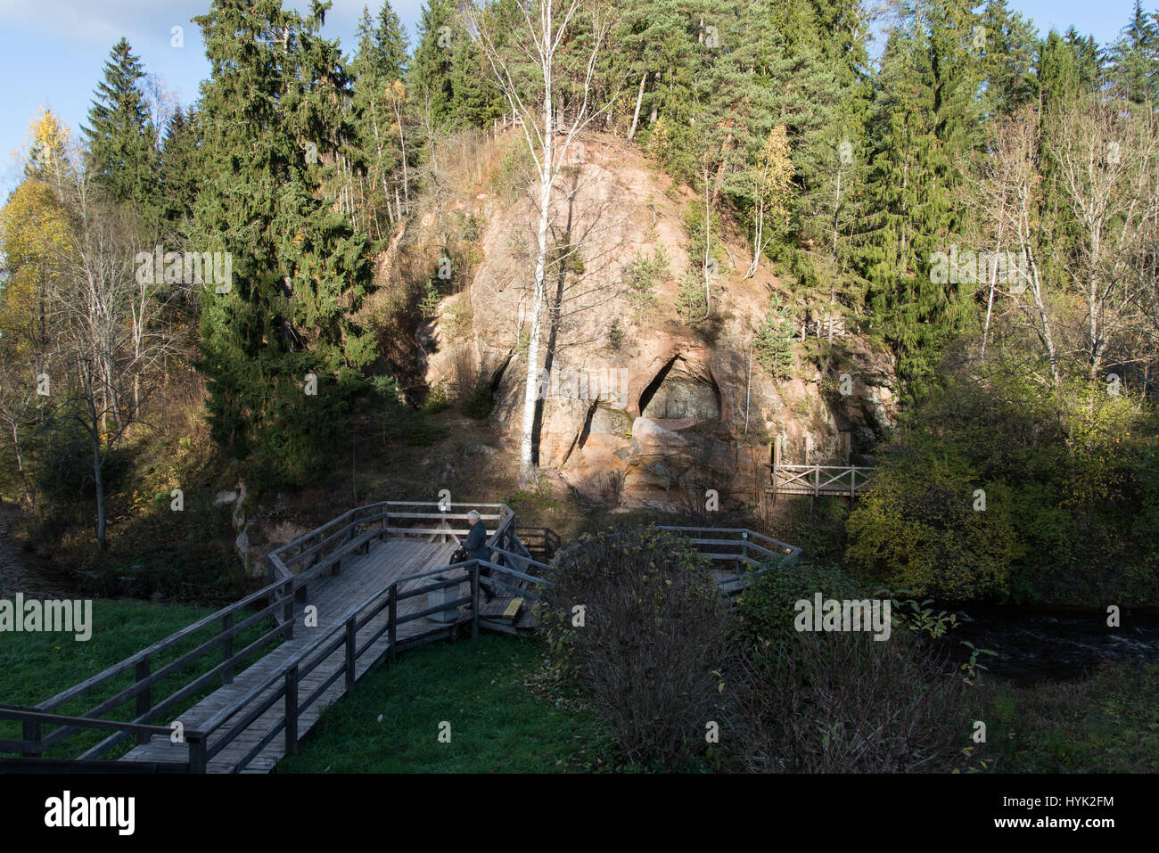 ancient sandstone cliffs with inscriptions in the Gaujas National Park ...