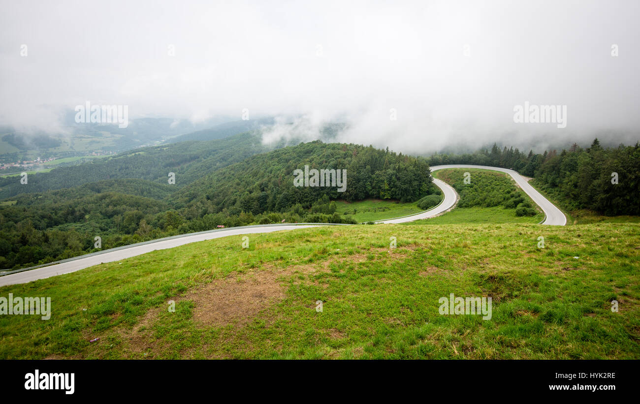 mountain country road in summer at countryside with trees around Stock ...