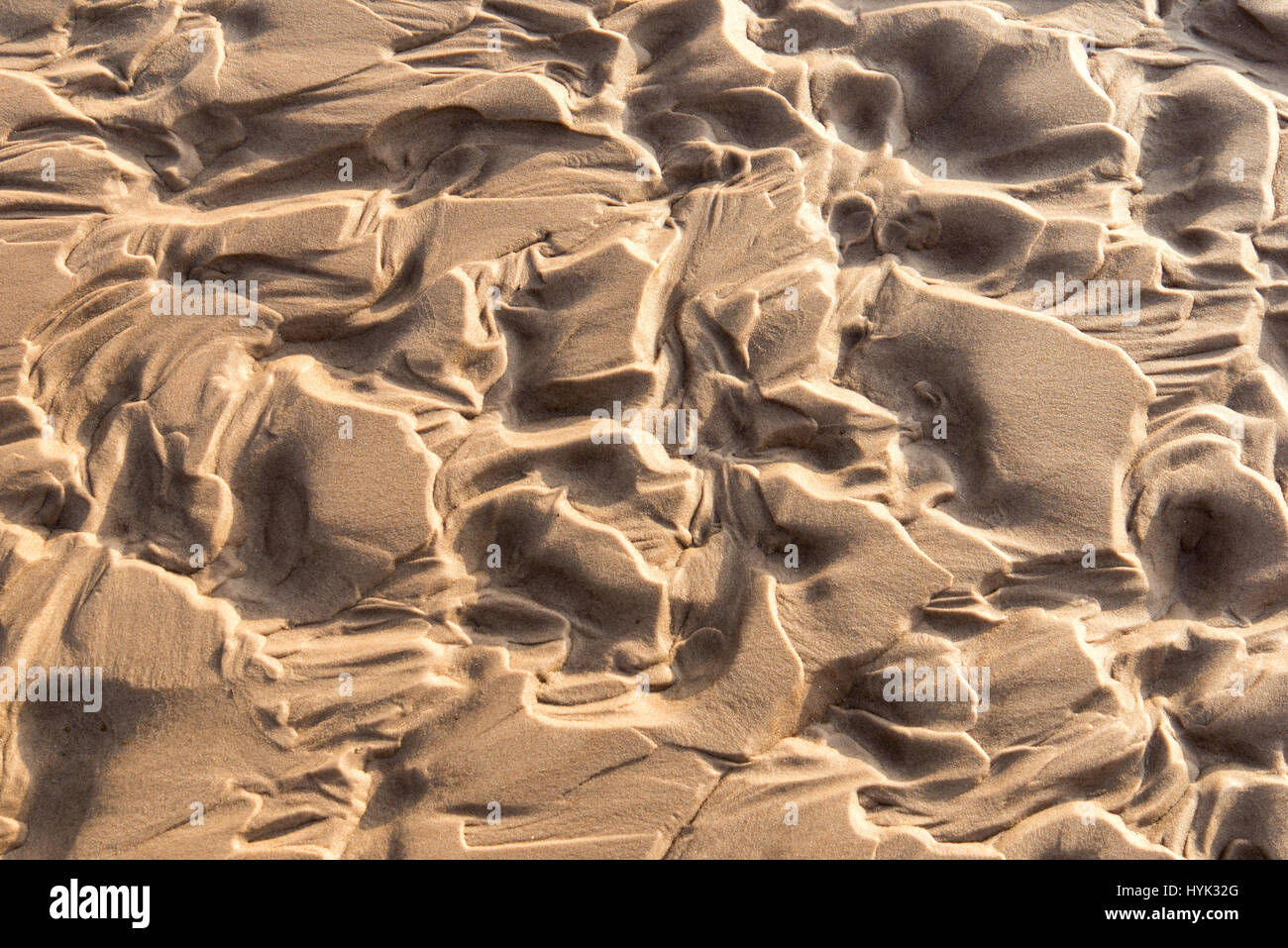 Wet sand texture in the sea shore beach Stock Photo - Alamy