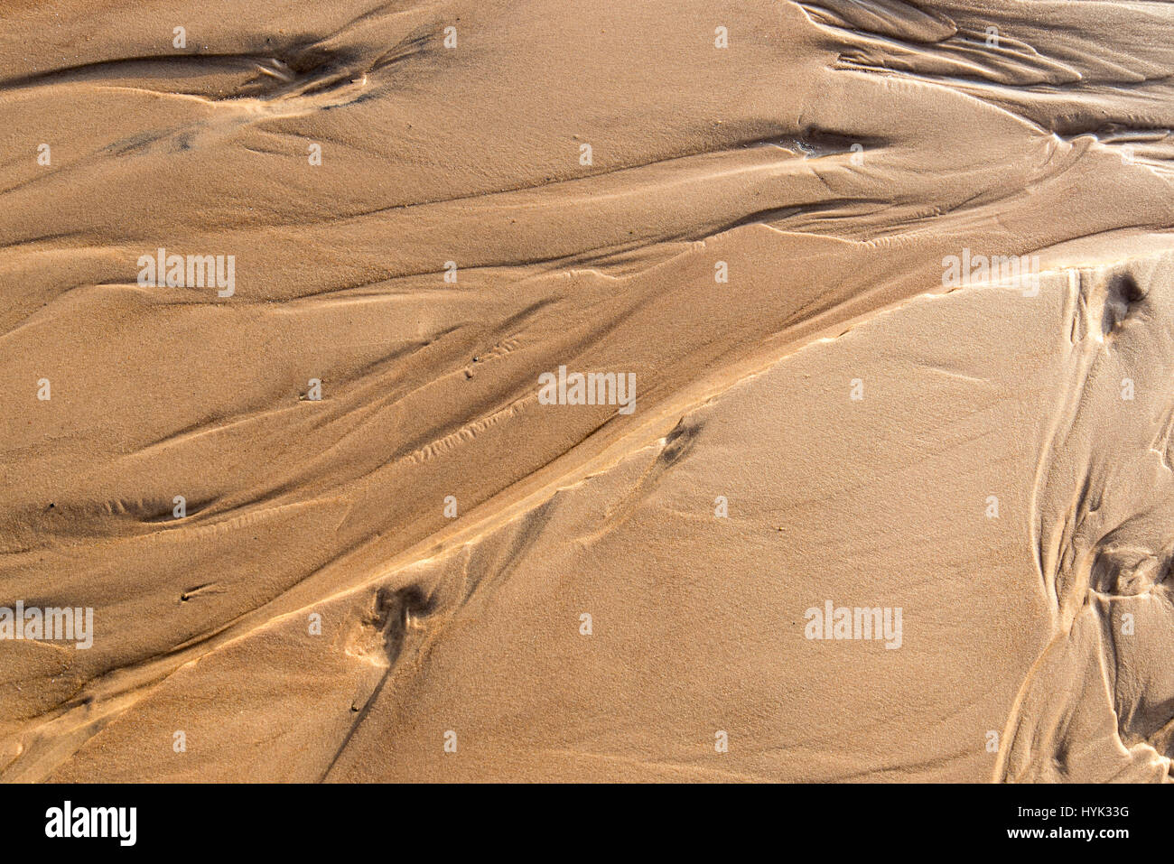 Wet sand texture in the sea shore beach Stock Photo - Alamy
