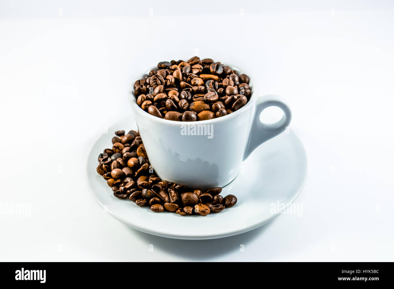 Coffee beans and coffee cup Stock Photo - Alamy