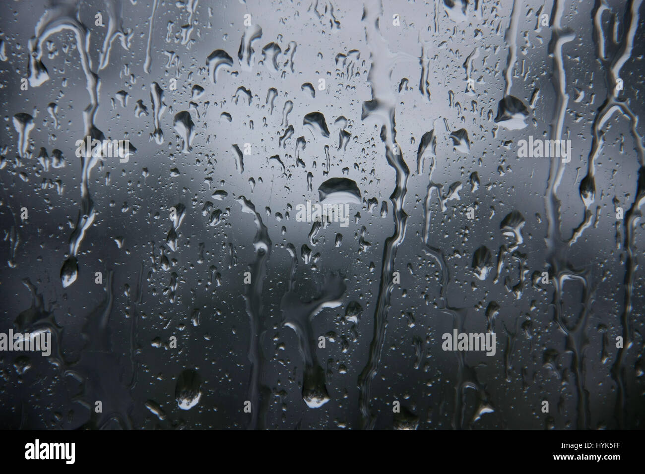 water drop, rain drop on glass and dripping down Stock Photo - Alamy