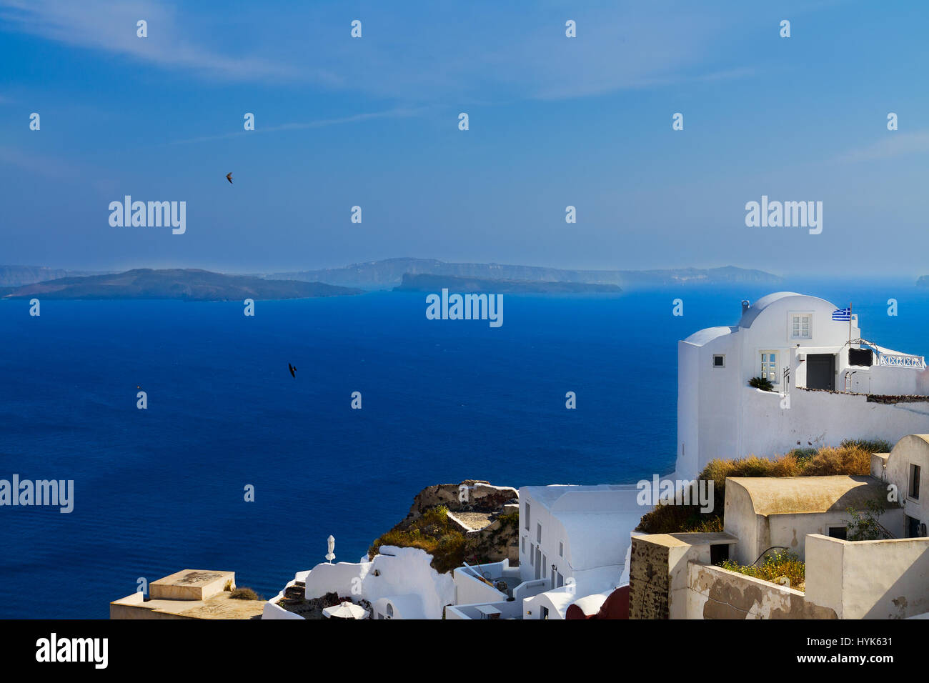 lanscape of Oia village with volcano caldera and Aegan sea, beautiful ...