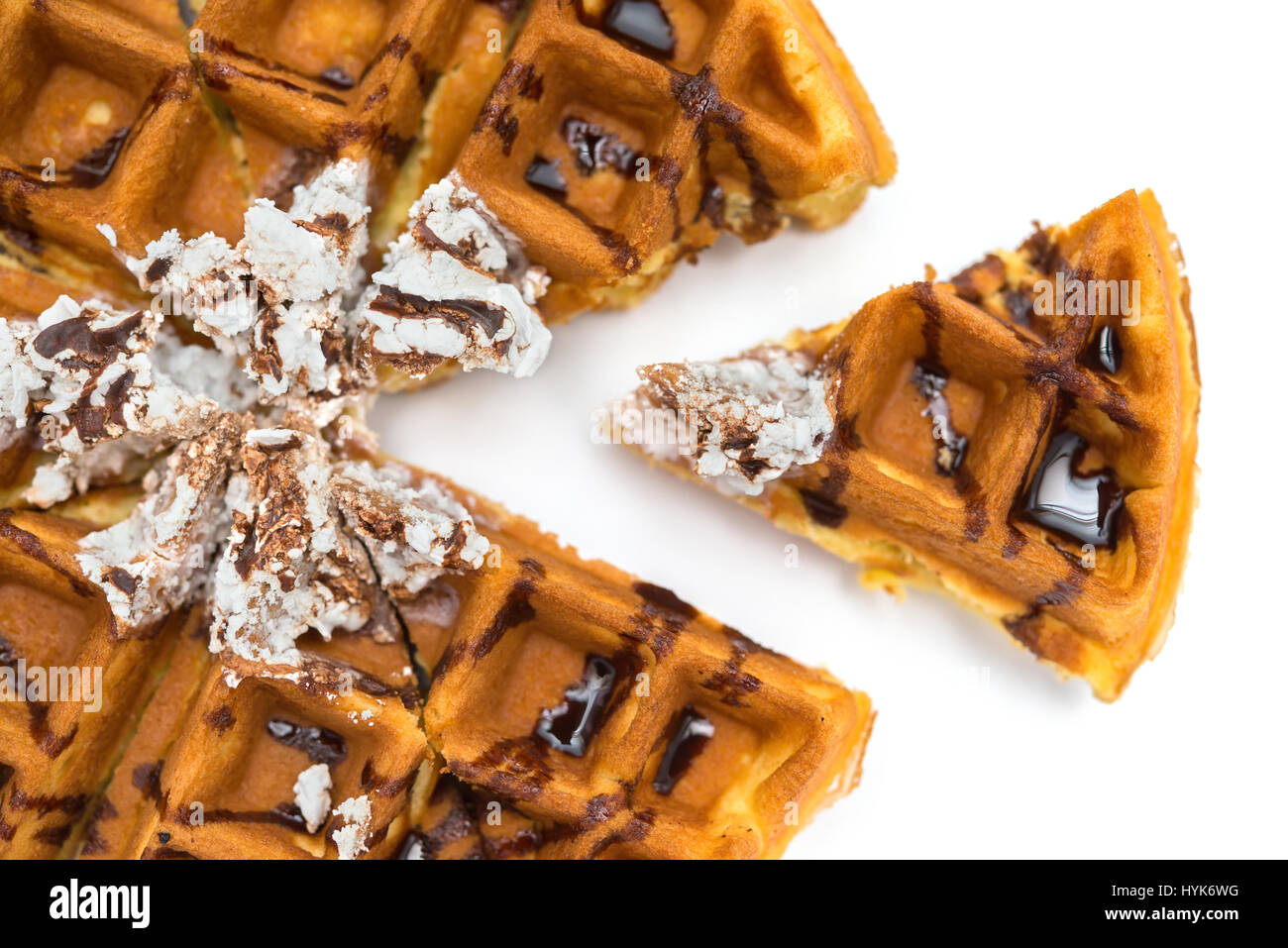 top view round waffle with one piece taking out close up on a white ...