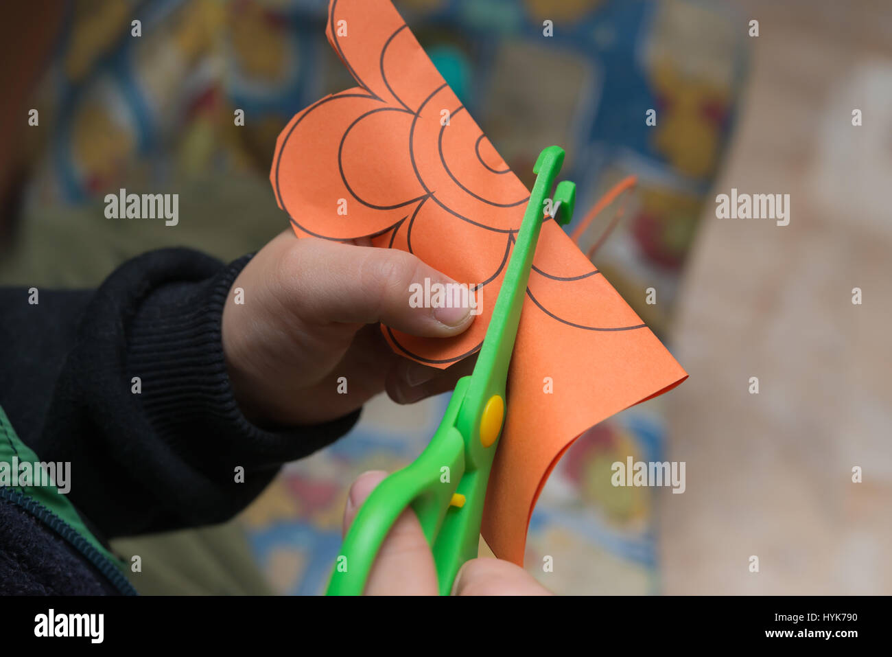 kid doing paper cutting at home Stock Photo - Alamy