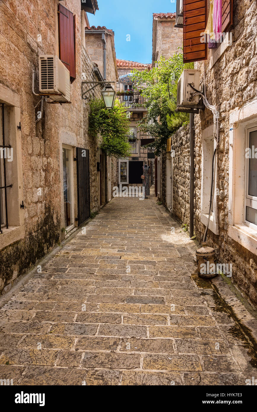Historic architecture, narrow stone walkways, and decorative balconies ...