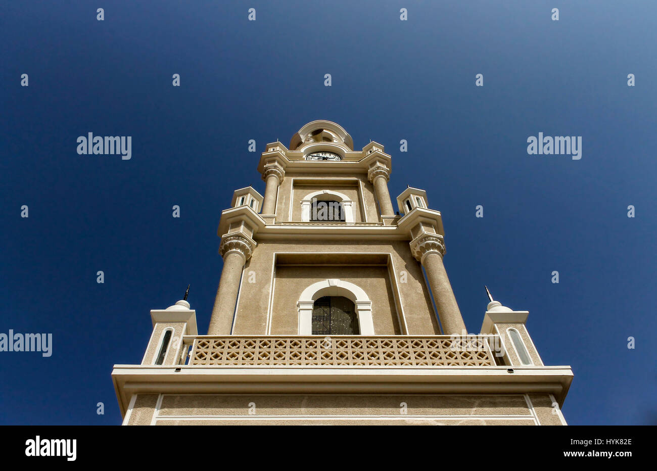 The clock tower of the cathedral of Virgin Mary, in the village of ...