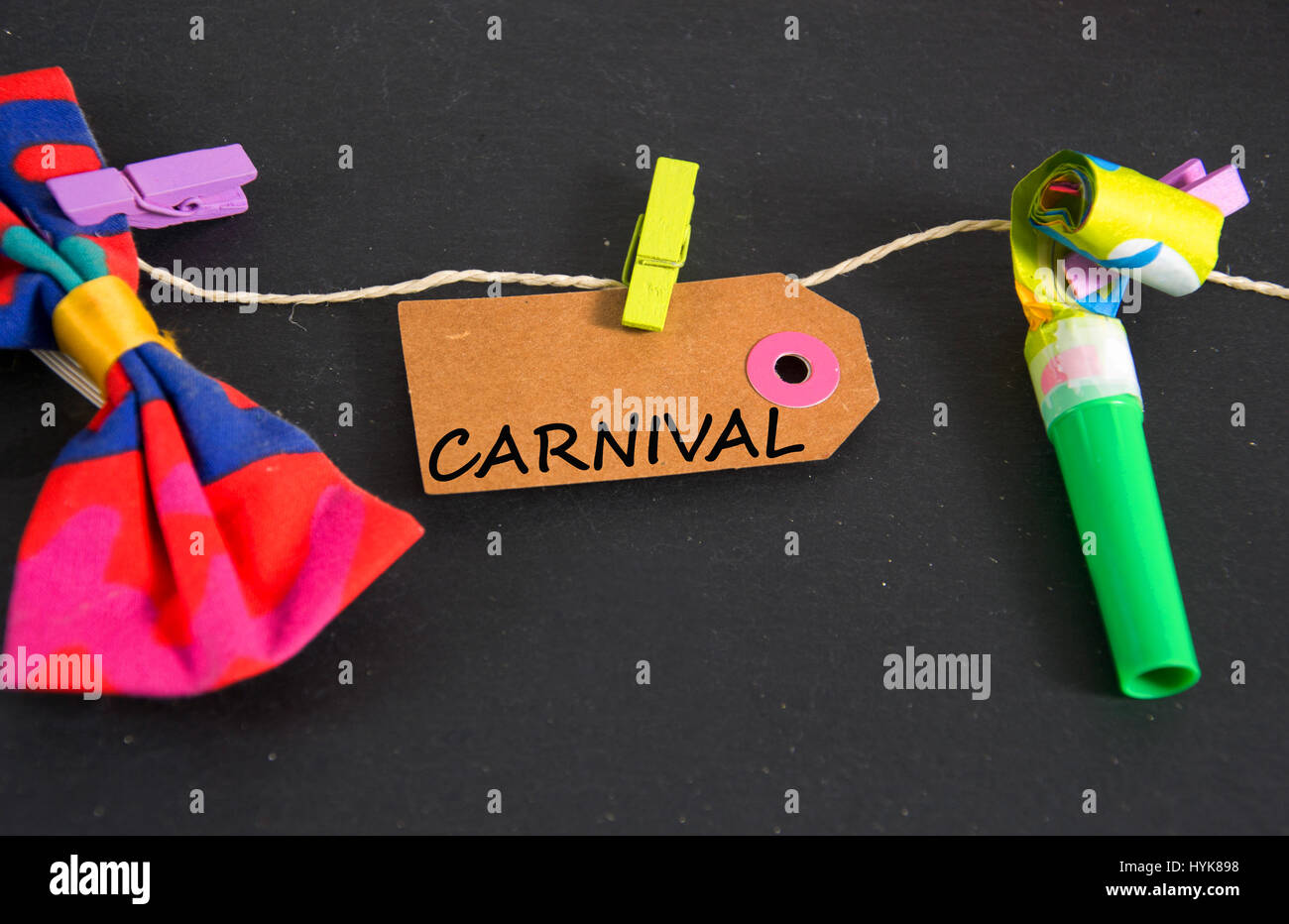 carnival written on a paper tag Stock Photo - Alamy