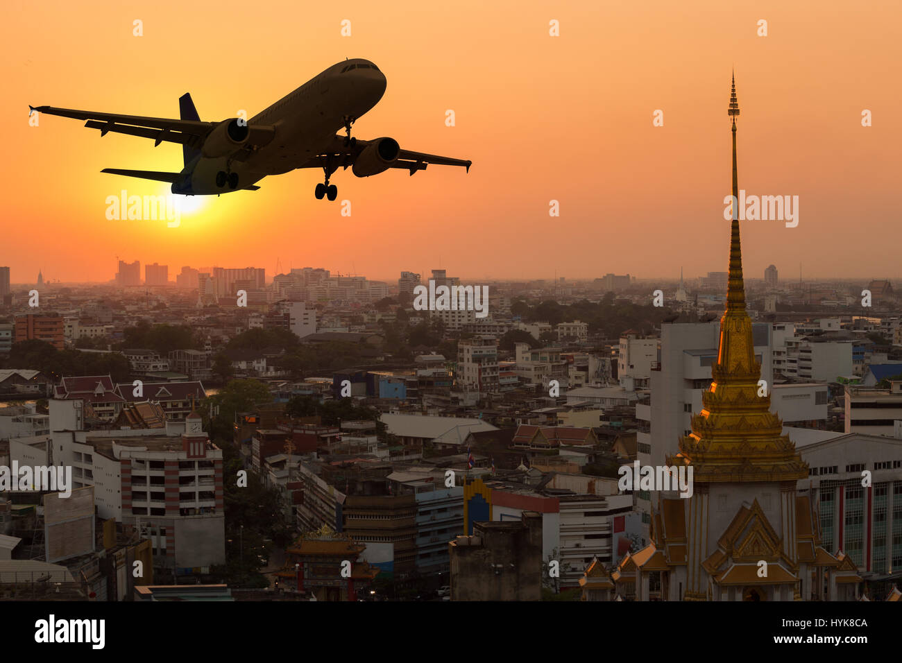 Airplane Flying Over City