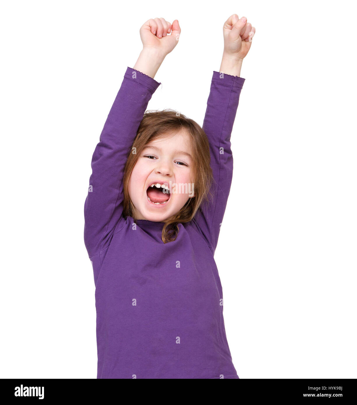 Close up portrait of a young girl cheering with raised arms on isolated ...