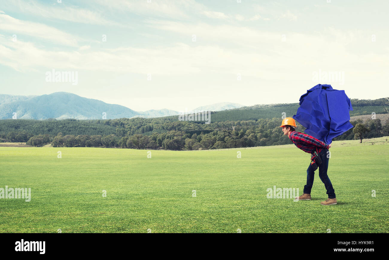 Engineer man carry load Stock Photo - Alamy