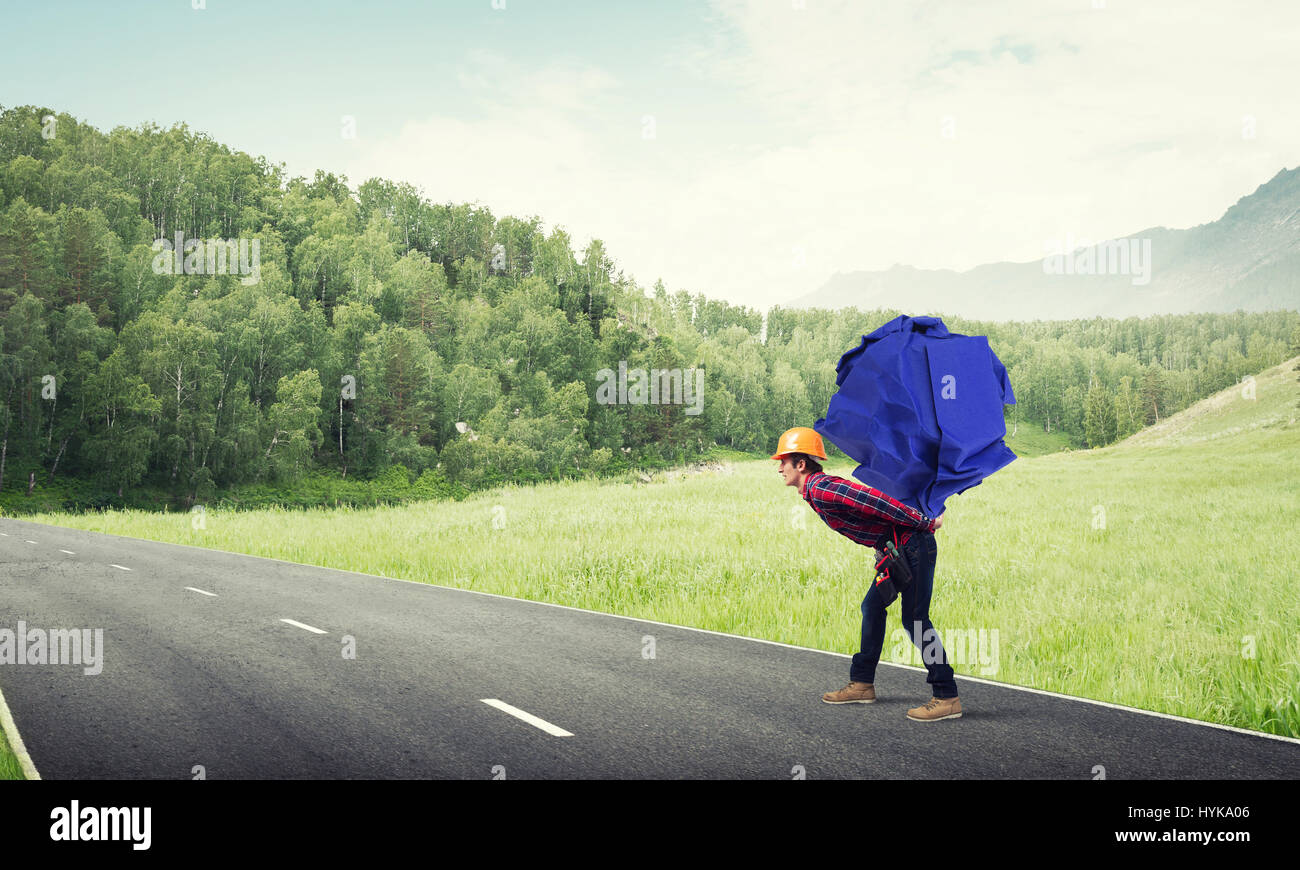 Engineer man carry load Stock Photo - Alamy