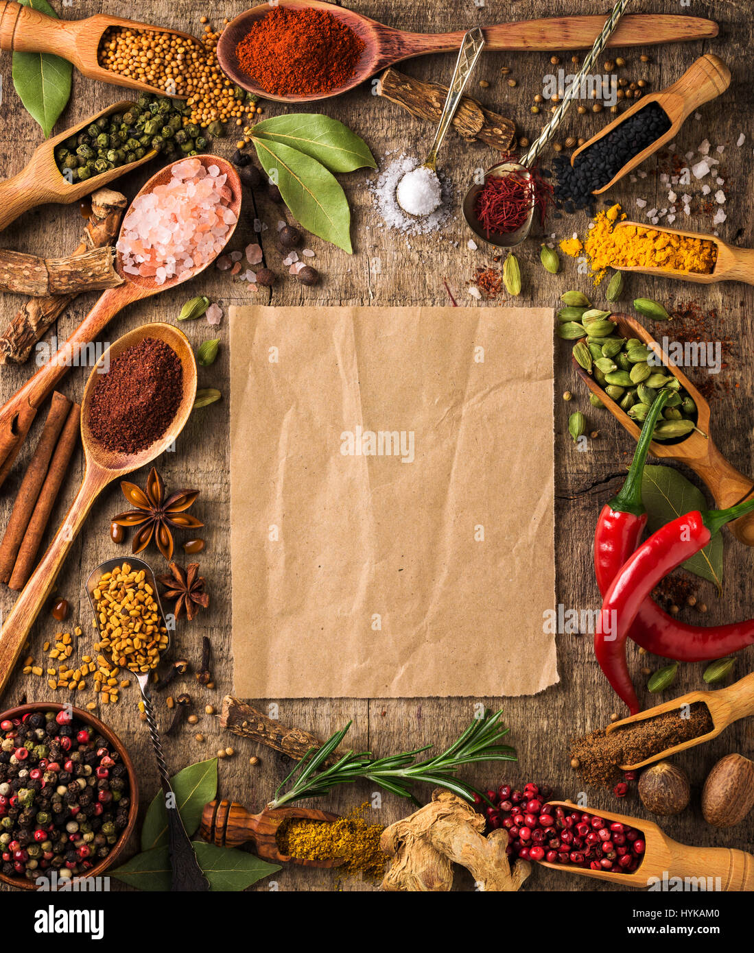 Different spices around kraft paper Stock Photo - Alamy