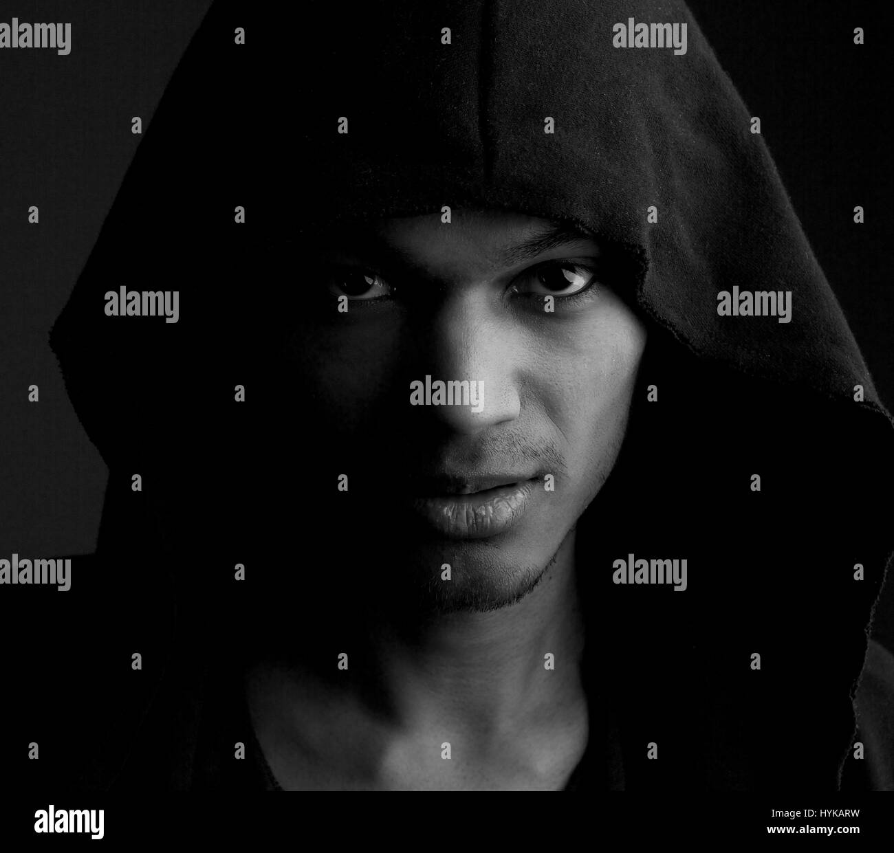 Black and white portrait of a male fashion model with serious ...