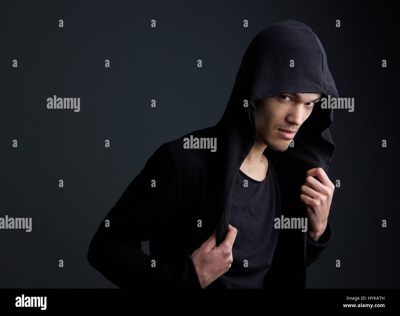 Portrait of an asian male fashion model on gray background Stock Photo ...