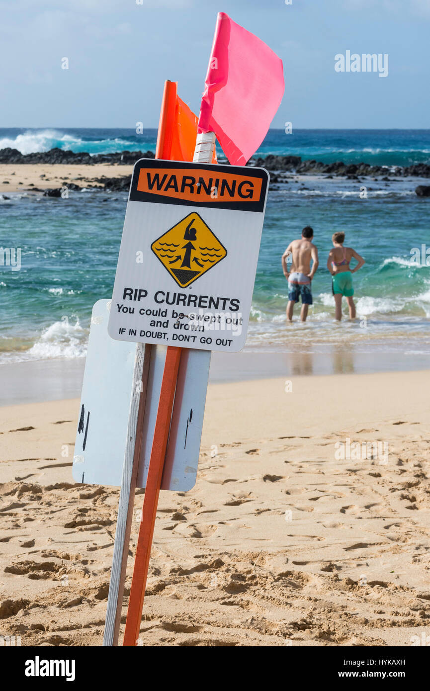 Sign warns swimmers of rip currents, Poipu Beach, Kauai, Hawaii, USA ...