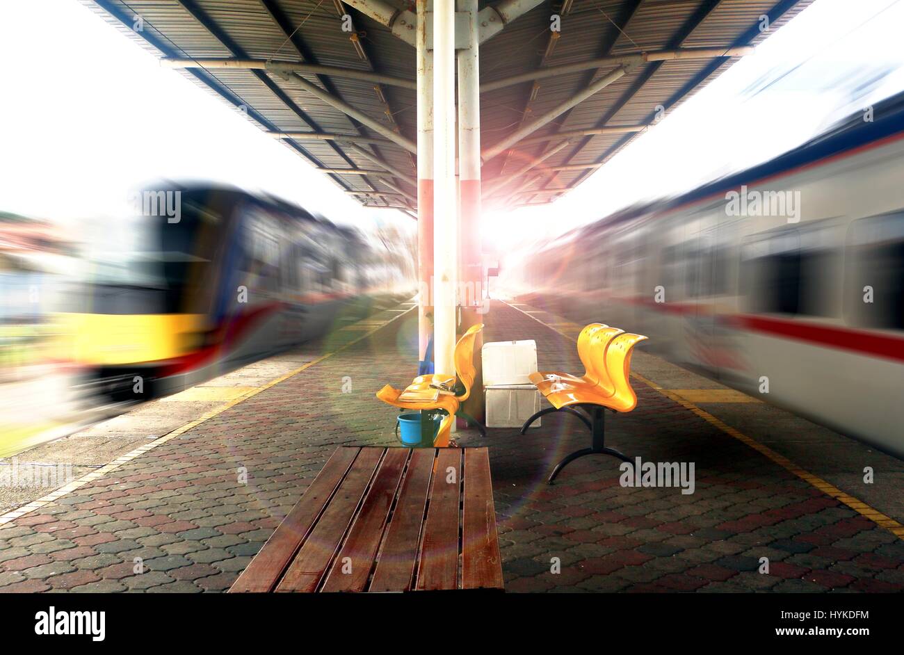 Empty train station with fast moving trains Stock Photo - Alamy