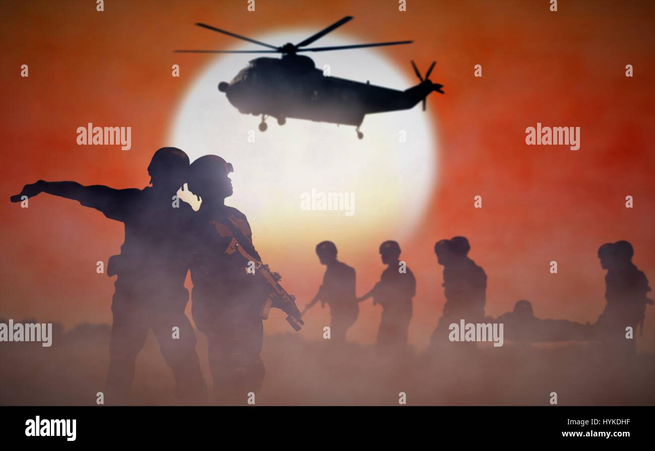 Military helicopter rescue mission during sunset Stock Photo - Alamy