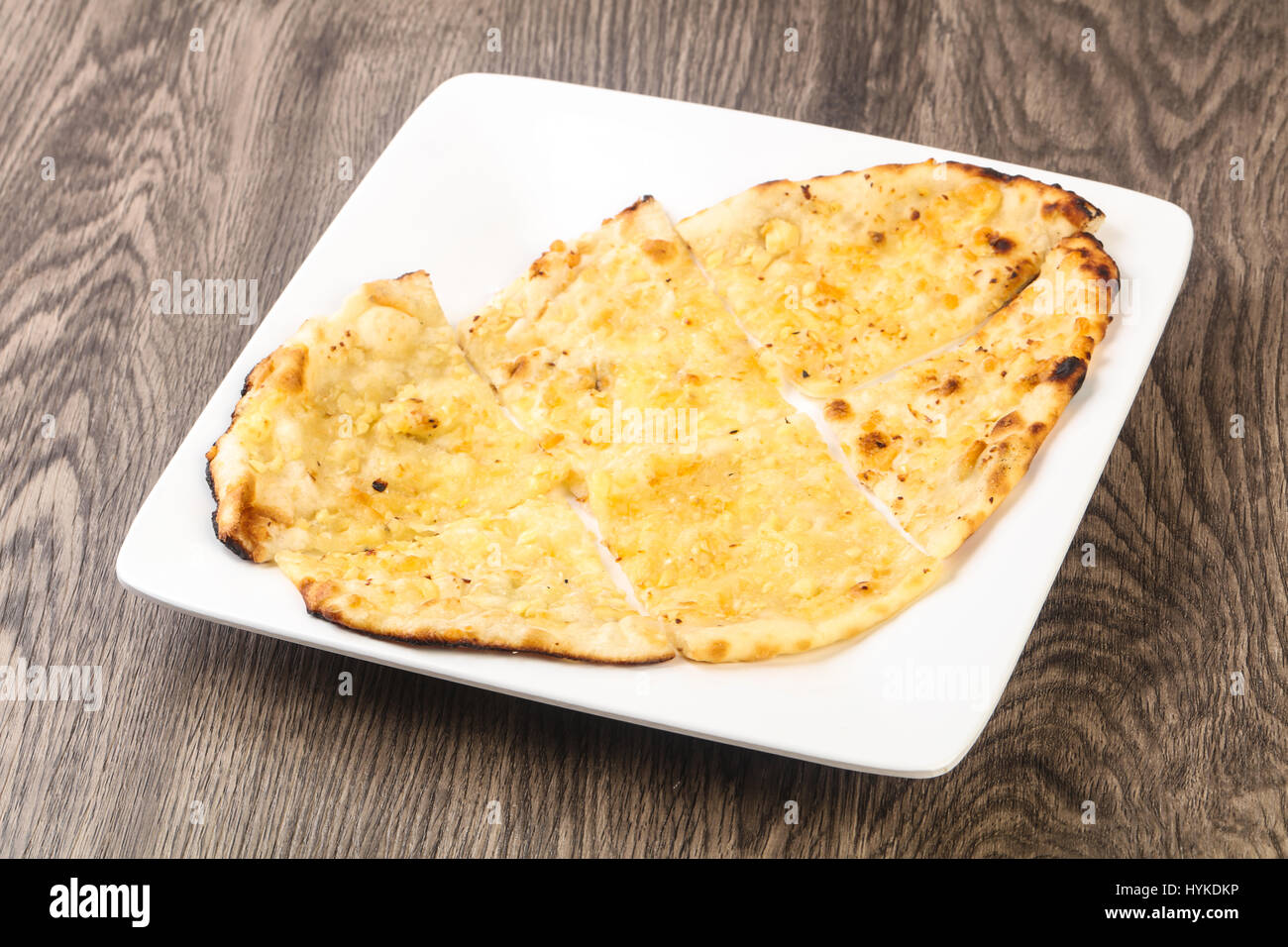 Indian bread - Naan with cheese and garlic Stock Photo - Alamy