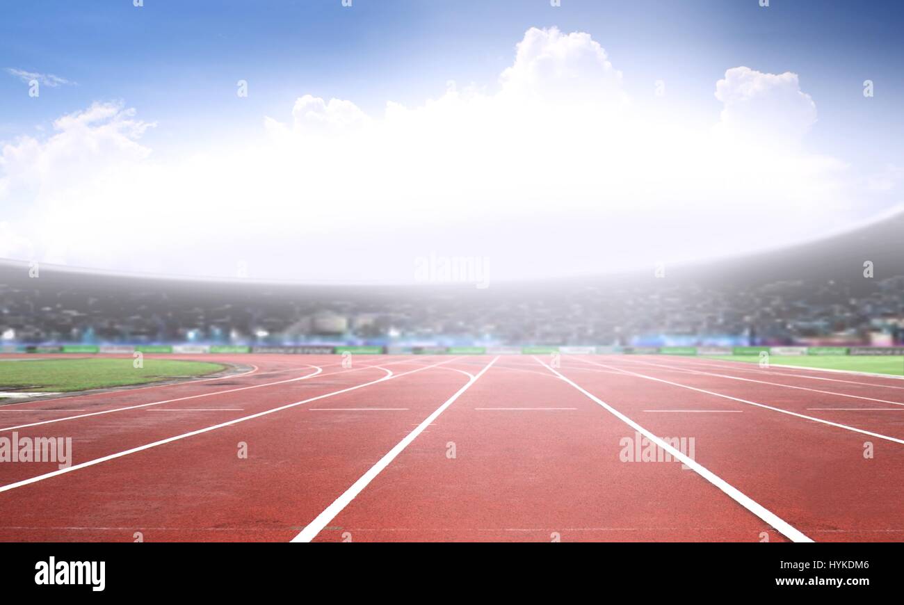 Running track in a stadium under bright sunlight Stock Photo - Alamy