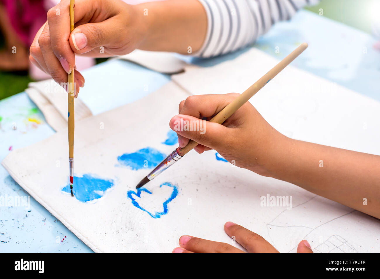 Education, Mixing Water Colors in a painting Class Stock Photo - Alamy