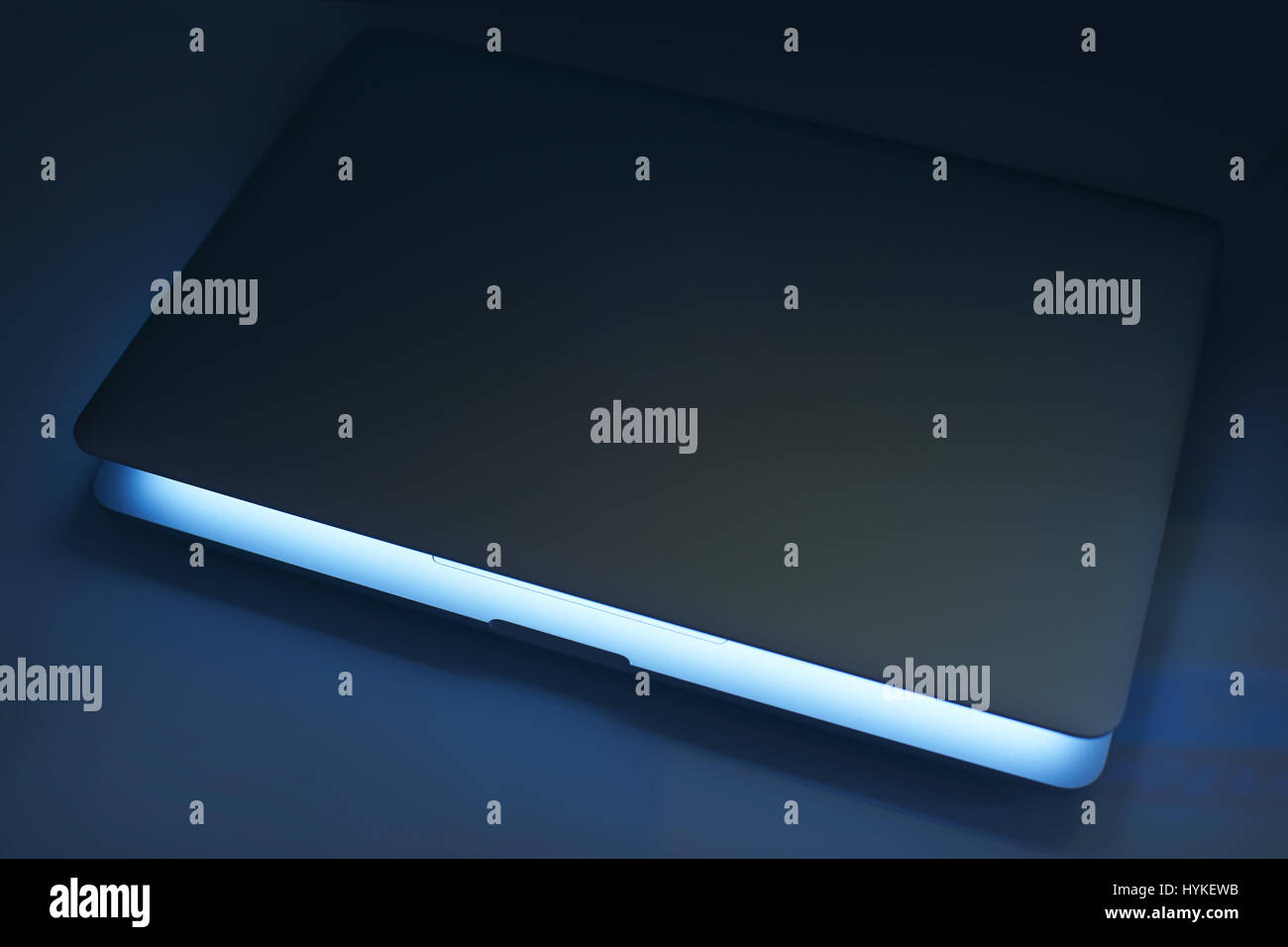 Laptop half close with white screen .Low Key lighting and close up ...