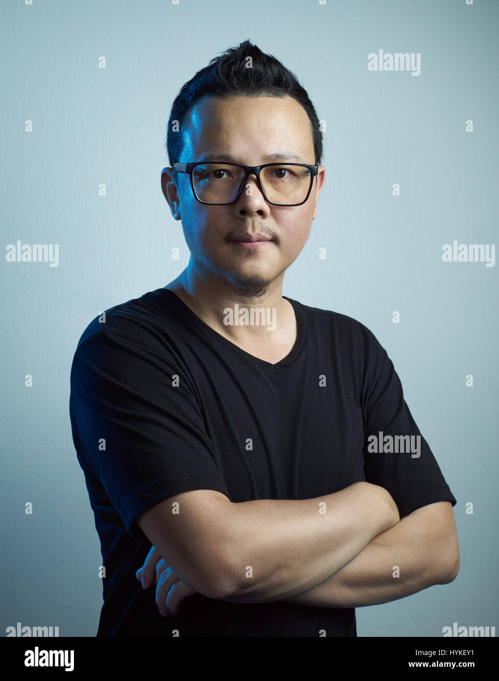 Chinese male model in black hi-res stock photography and images - Alamy