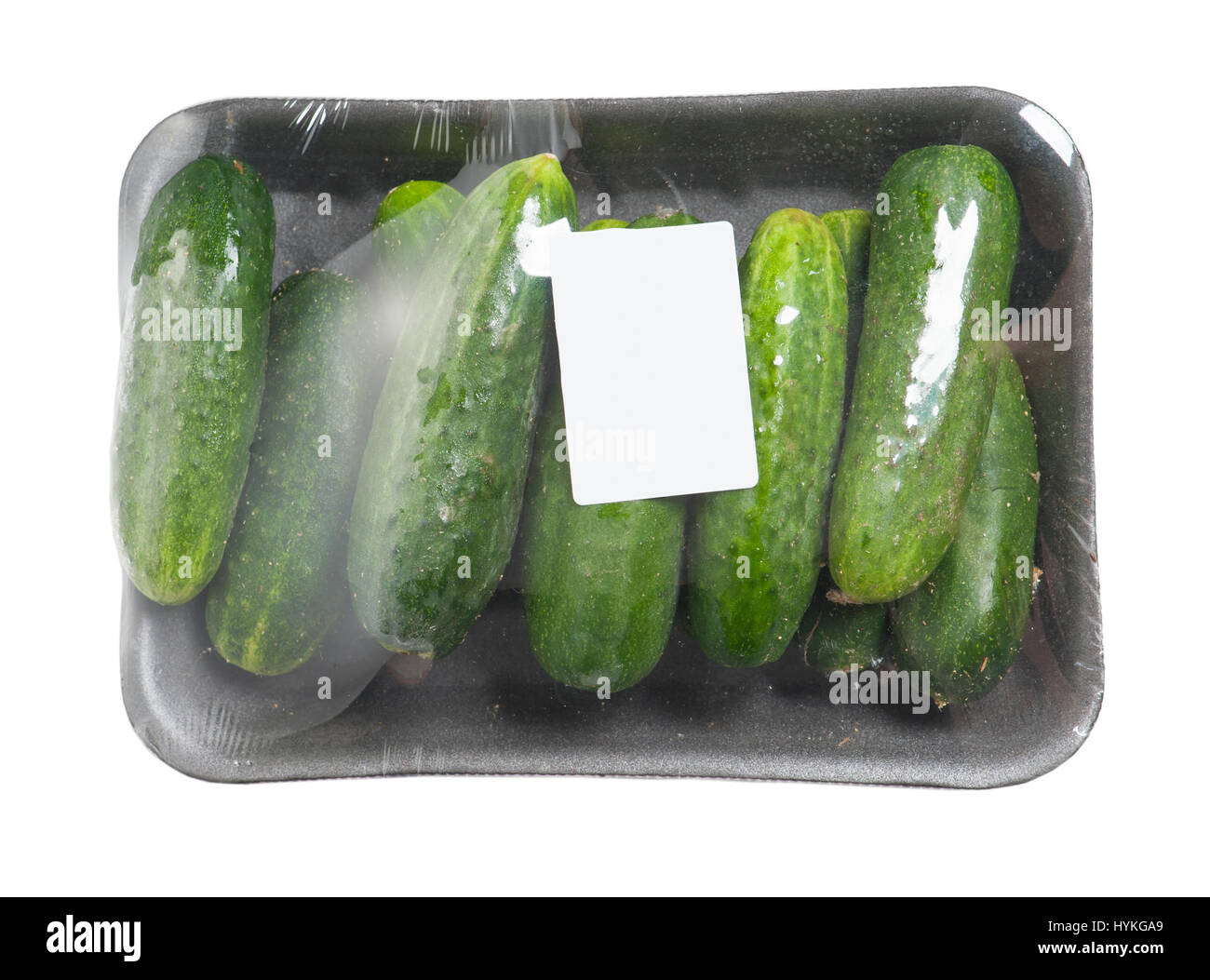 Pack of cucumbers isolated on white background Stock Photo - Alamy