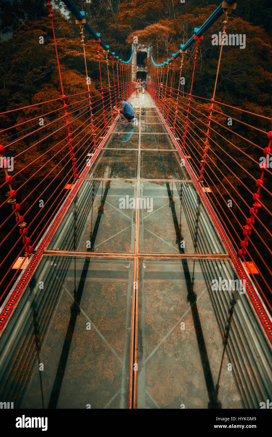 NANTOU, TAIWAN: A ONE HUNDRED and sixty four foot high GLASS footbridge ...