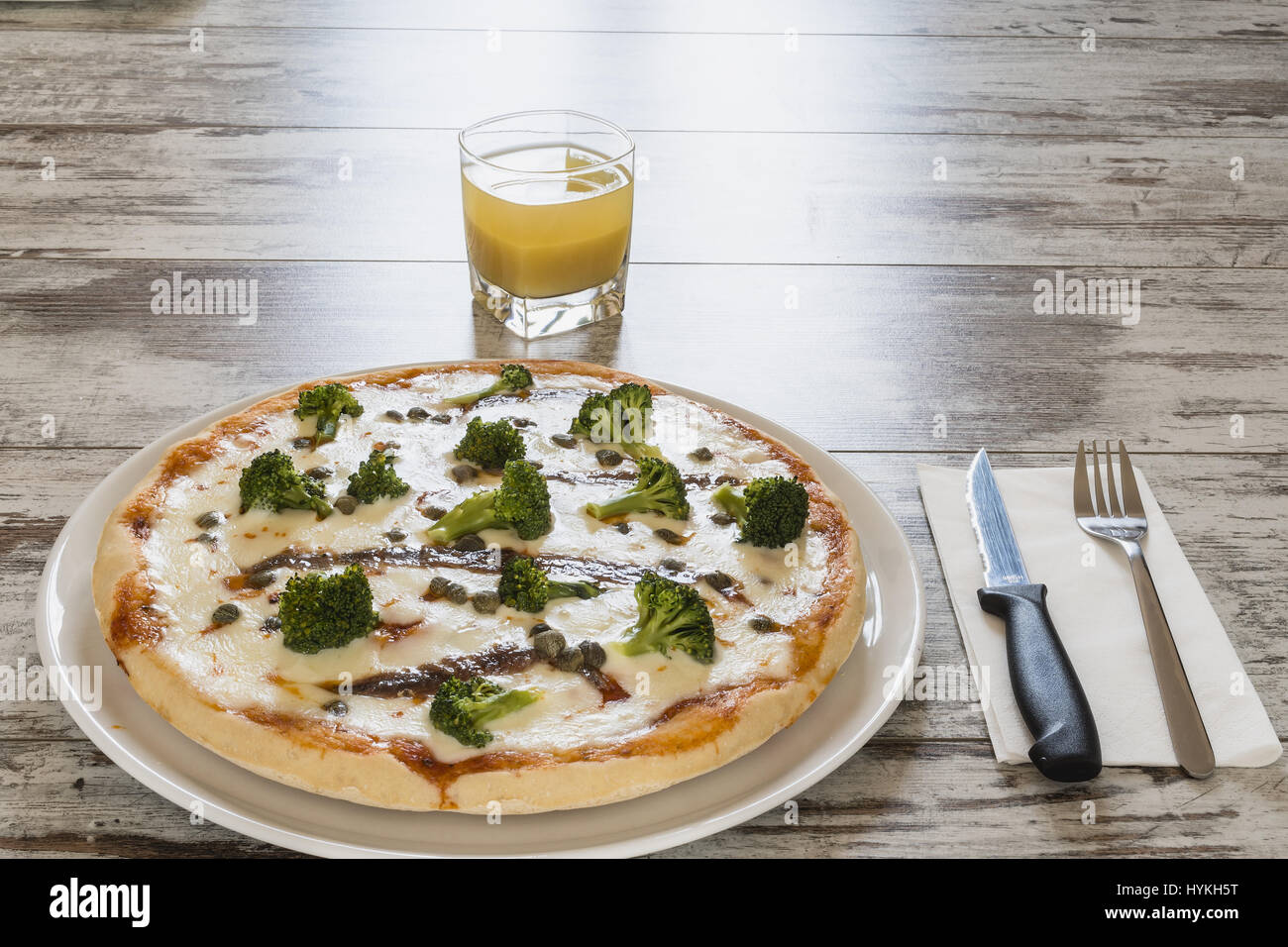whole pizza with glass front Stock Photo - Alamy