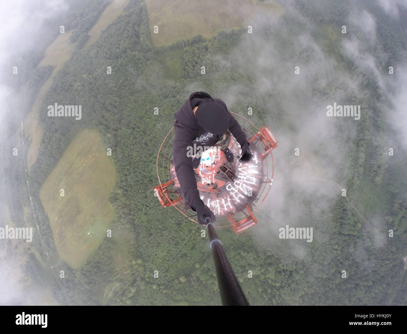 Urban explorer, Alex Nomernoy climbing a TV tower. A DAREDEVIL teenager ended up among the ...