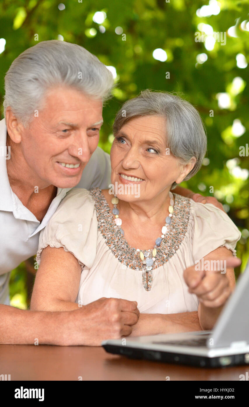 Elderly couple with a laptop Stock Photo - Alamy