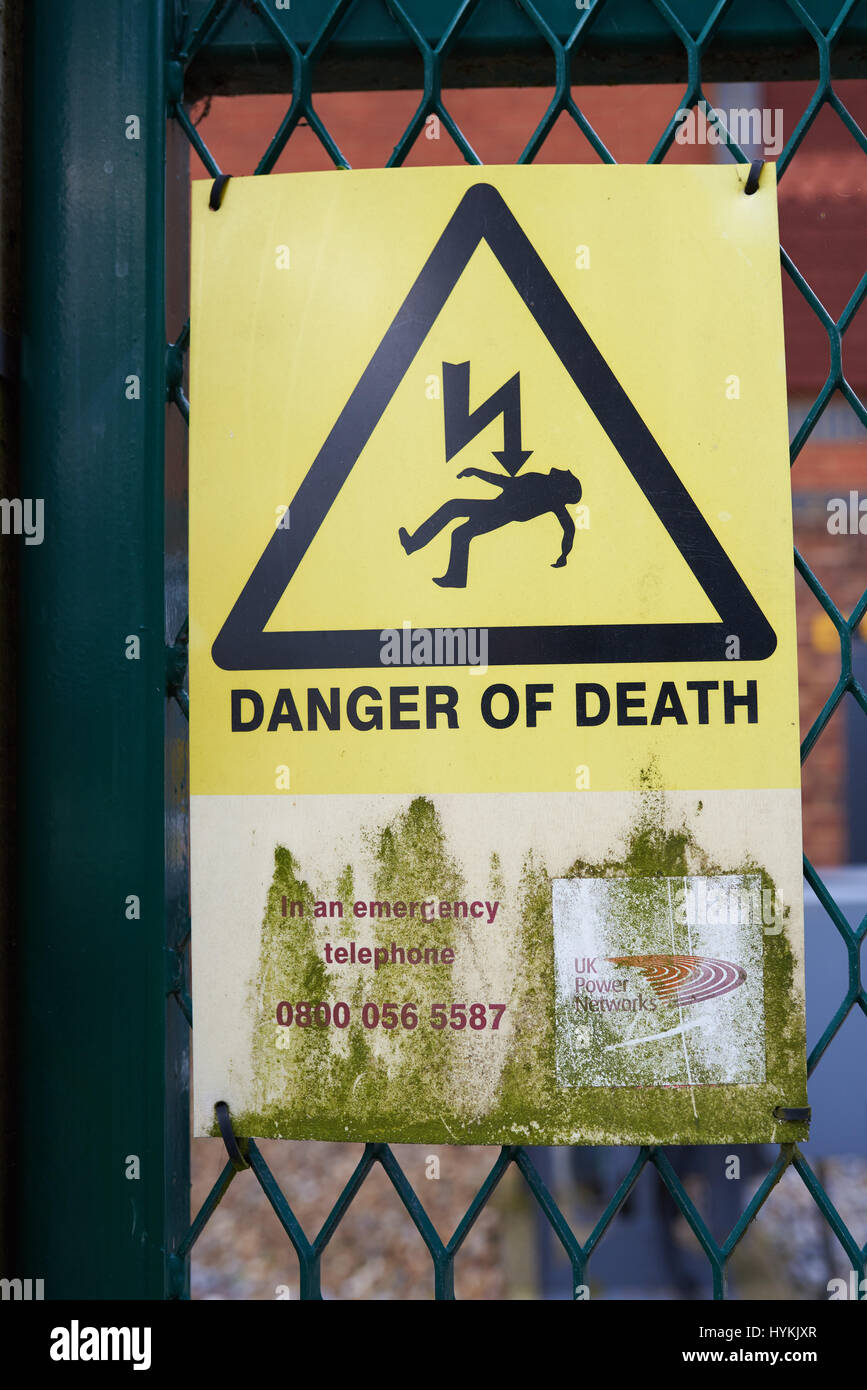 Public danger warning sign Stock Photo - Alamy