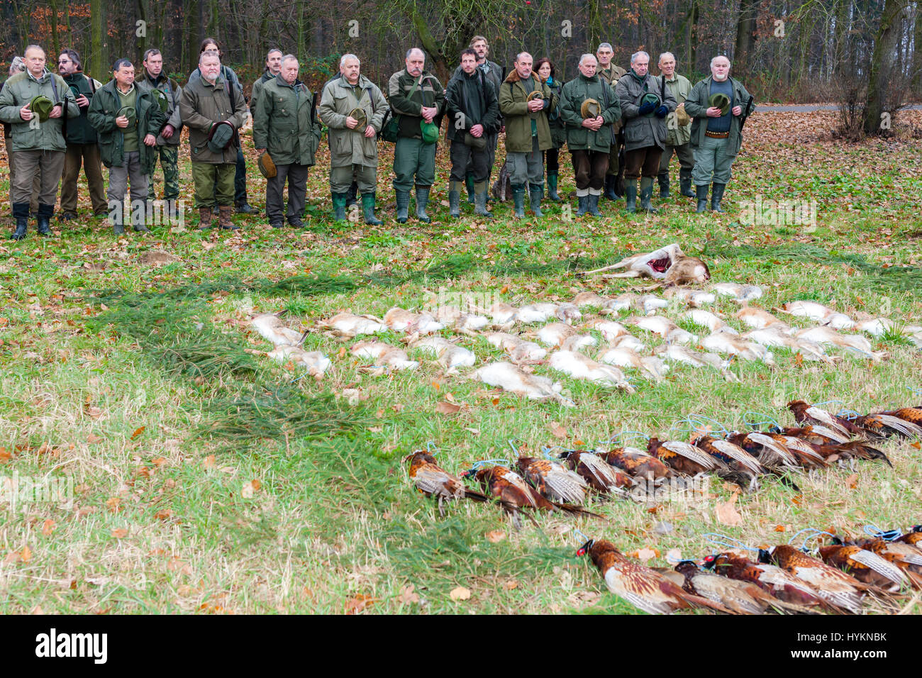 excludes of caught animals with hunters Stock Photo - Alamy