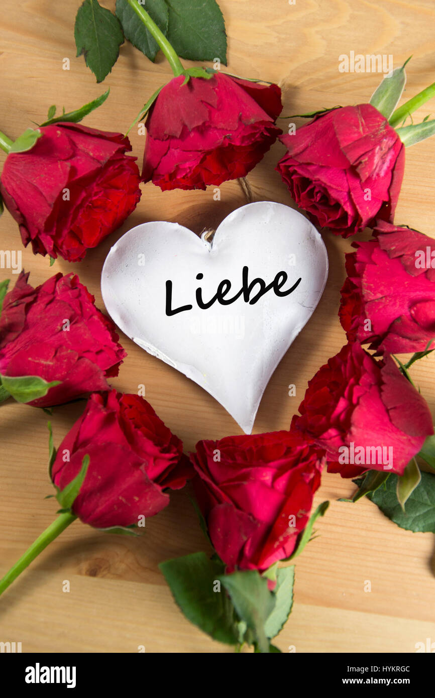 nice background with roses and a white heart Stock Photo - Alamy